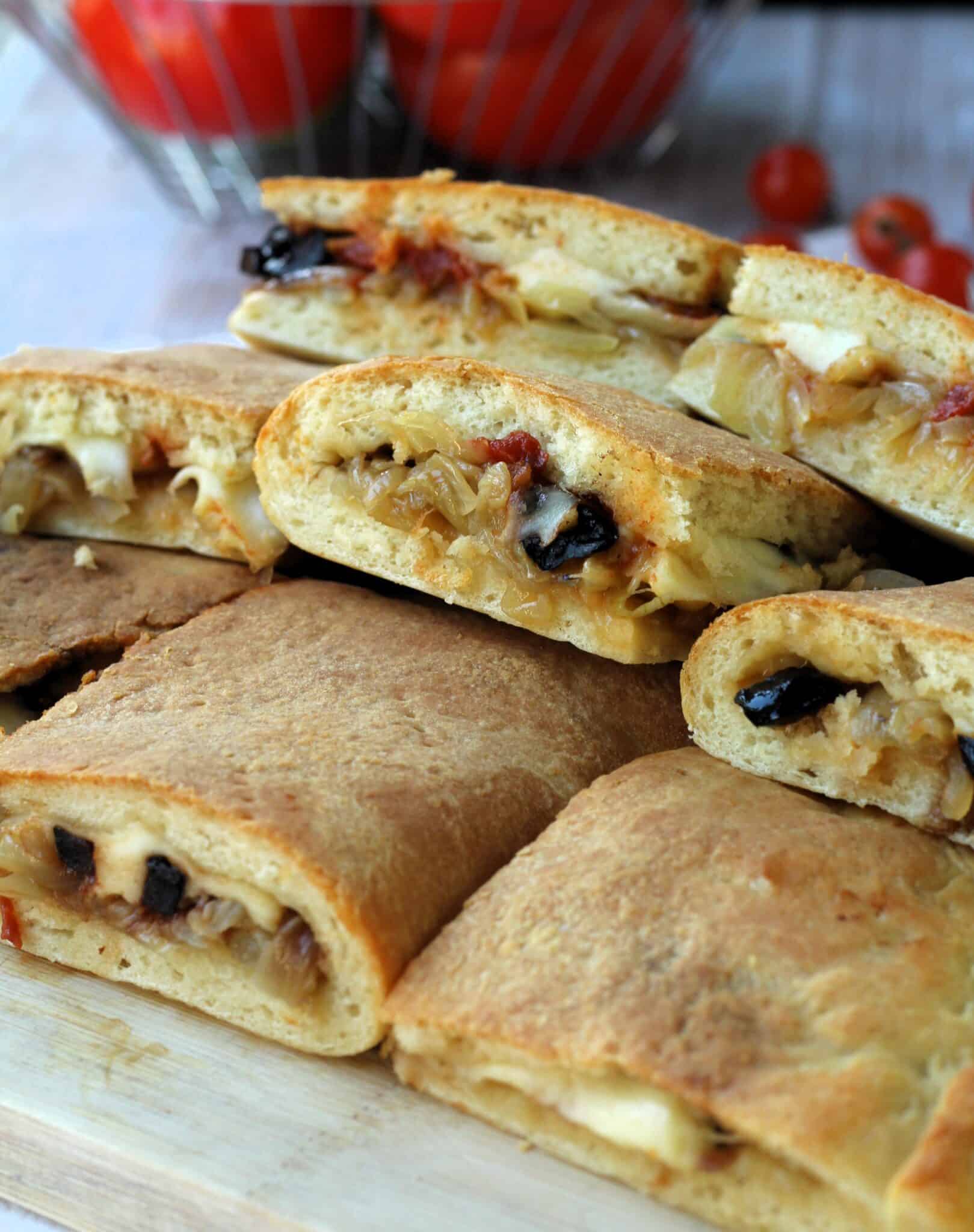 Sicilian Cudduruni with Onion Filling - Mangia Bedda